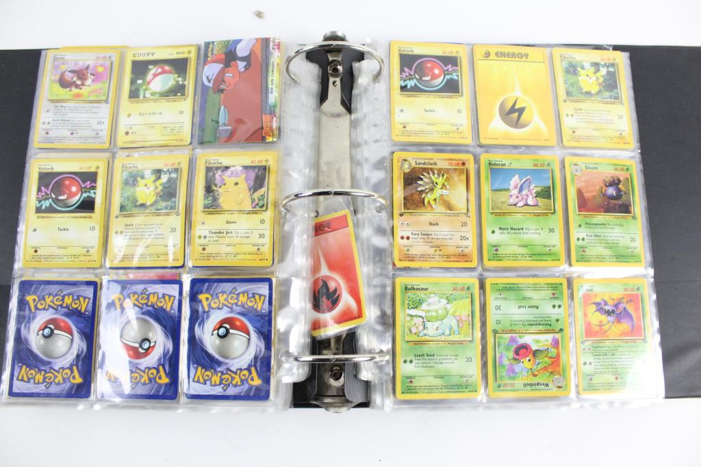Pokemon Cards Inside Black Binder, 100+ Pieces | Property Room