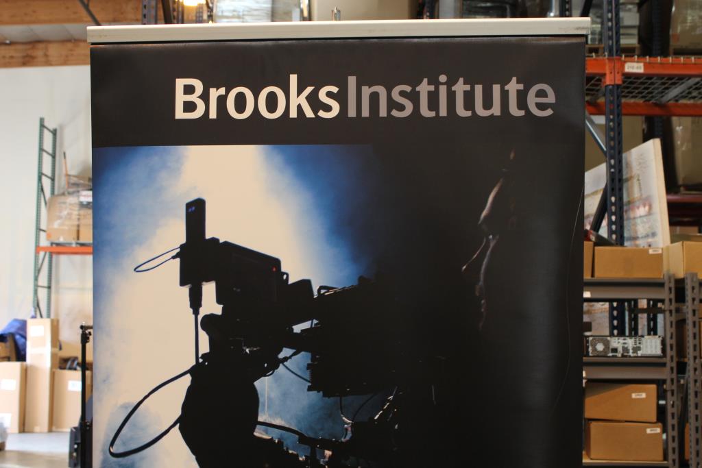 Pop Up Stand Advertisement For Brooks Intitute | Property Room