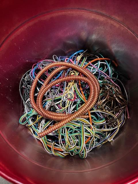 Red Canister With Misc Wire | Property Room