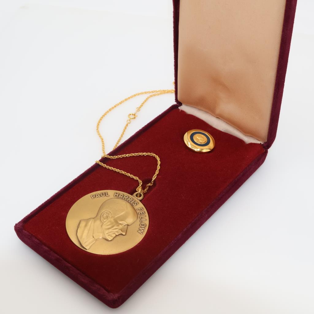 Rotary International Paul Harris Token Necklace And Pin Set | Property Room