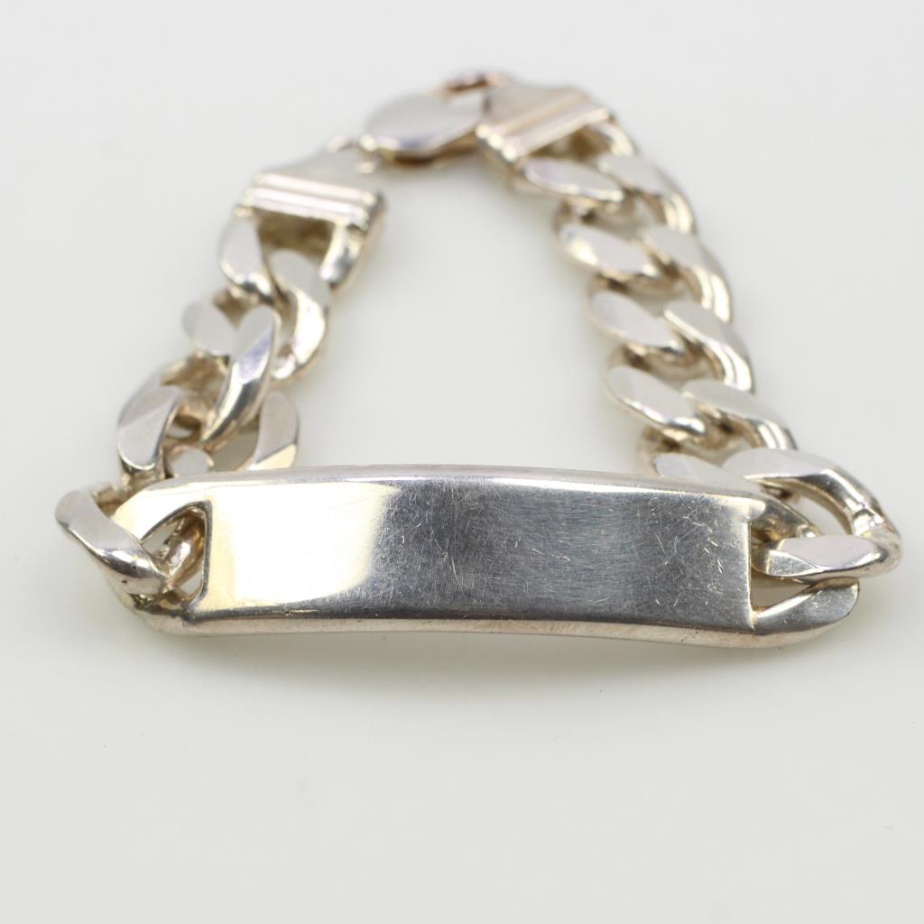 Silver Curb ID Bracelet | Property Room