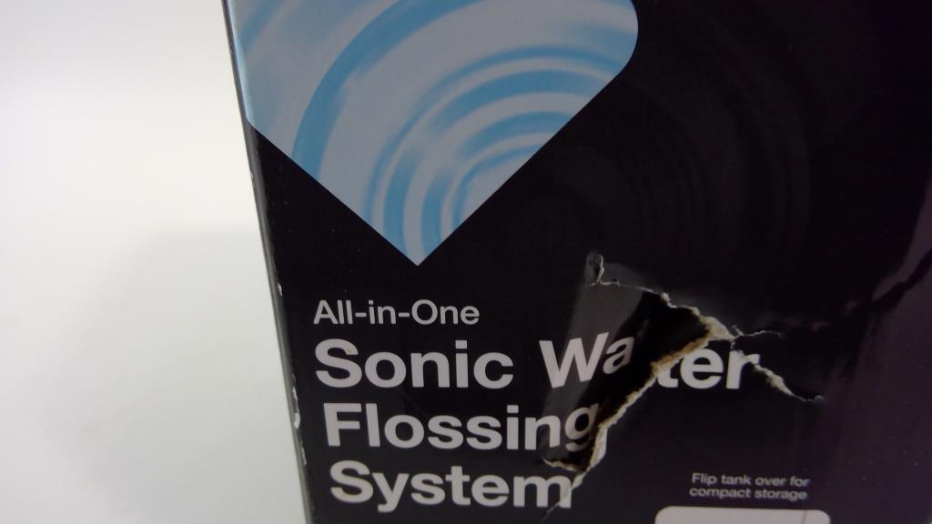 Sonic Water Flossing System | Property Room