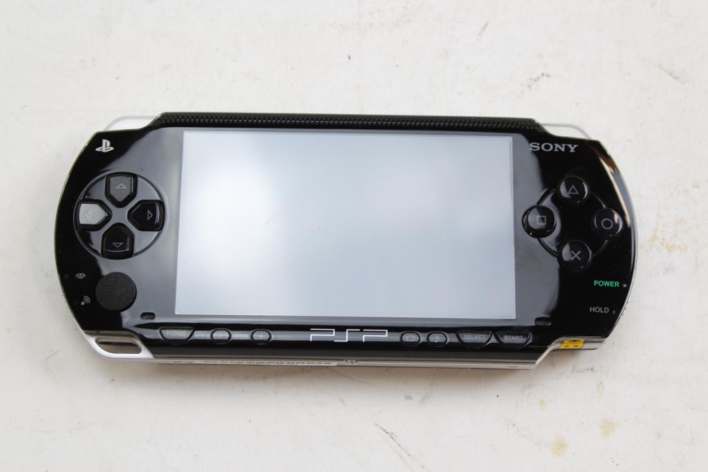 Sony PlayStation Portable Gaming System And Gretzky NHL Game | Property ...