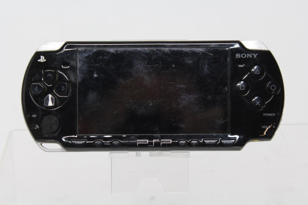 Sony PSP 2001, With Games And Accessories | Property Room