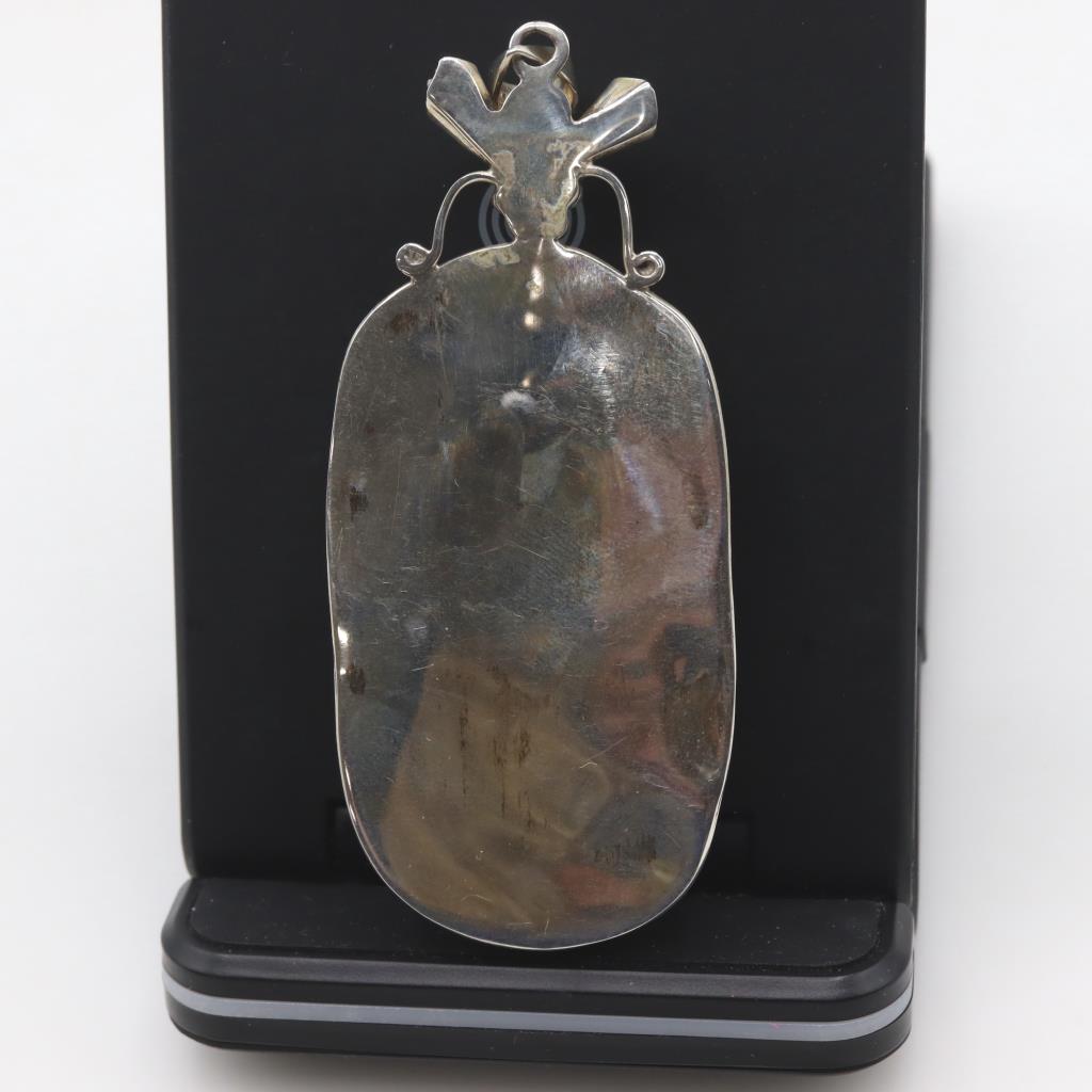 Sterling Silver White Stone Red Stone Accent Pendant | Property Room