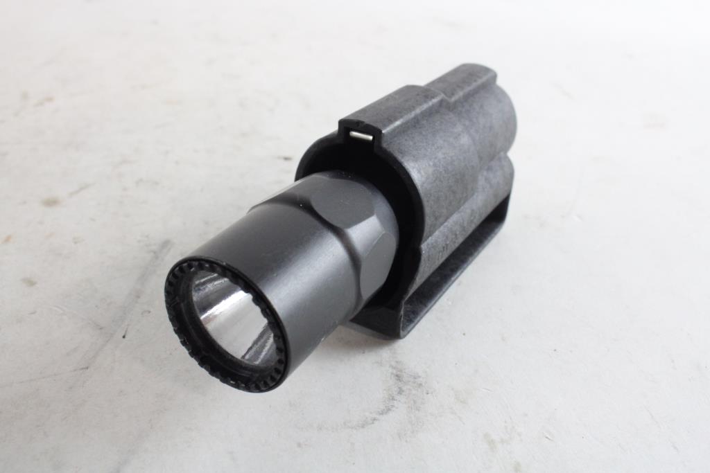 Surefire LED Flashlight With Holster | Property Room