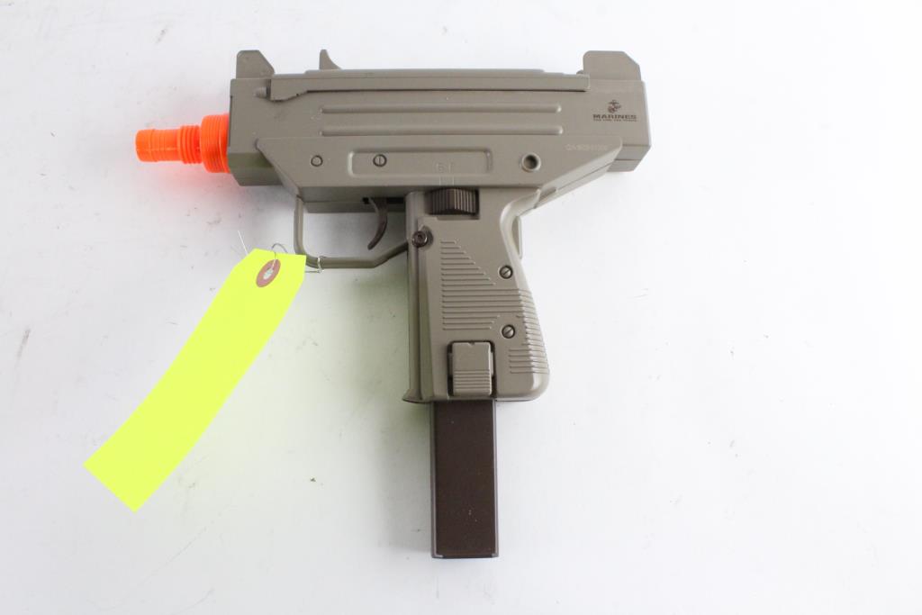 Tan Uzi Spring Airsoft Gun | Property Room