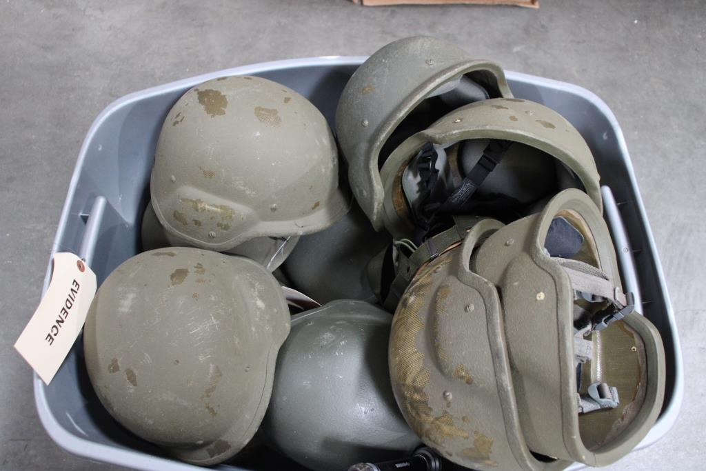 Tub With Used Military Helmets | Property Room
