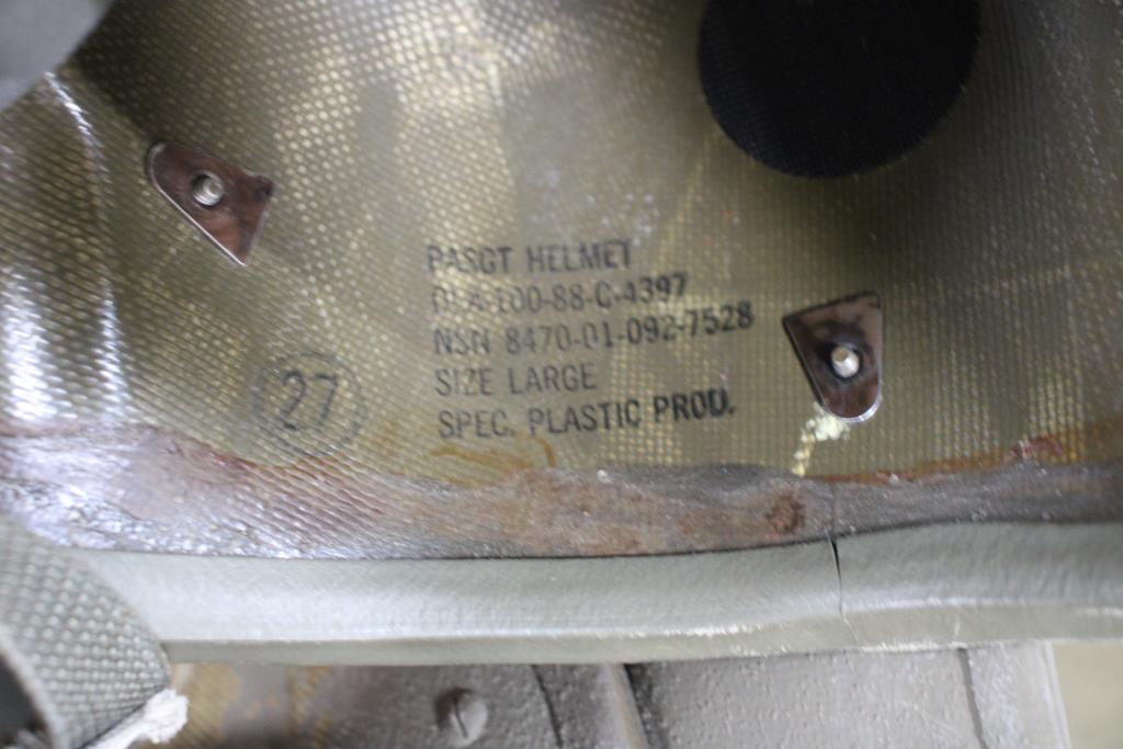 Tub With Used Military Helmets | Property Room