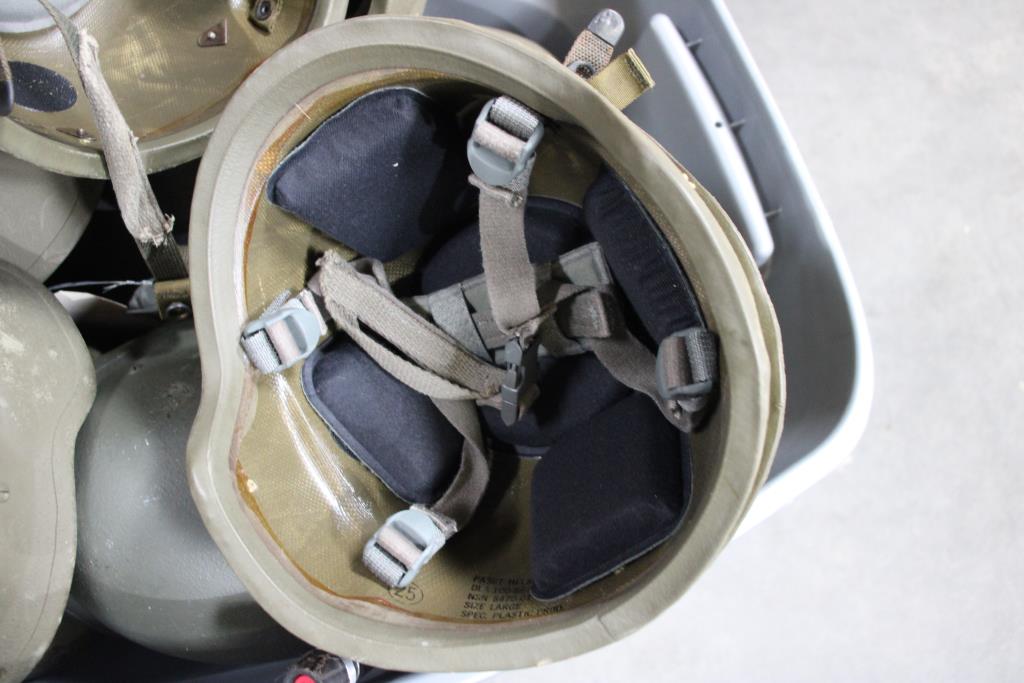 Tub With Used Military Helmets | Property Room