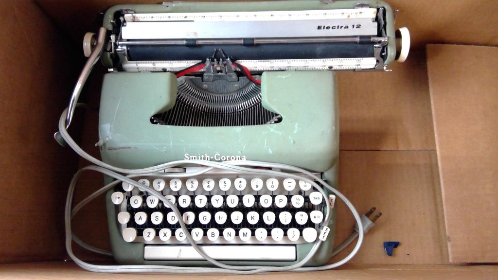 Type Writer And Money Order Machine | Property Room