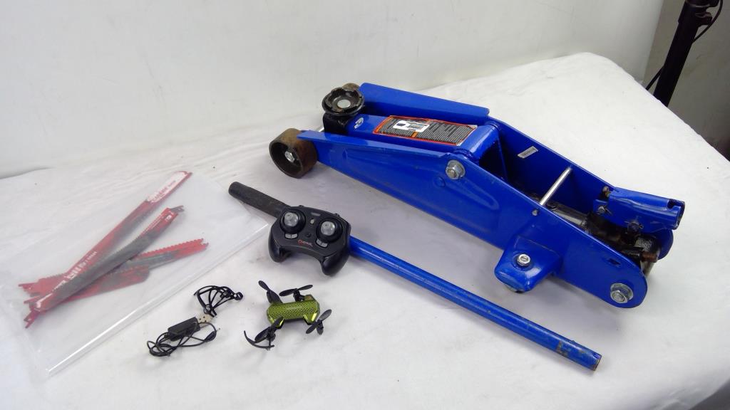 Voyage Aeronautics Micro Drone With Car Jack And Saw Blades | Property Room