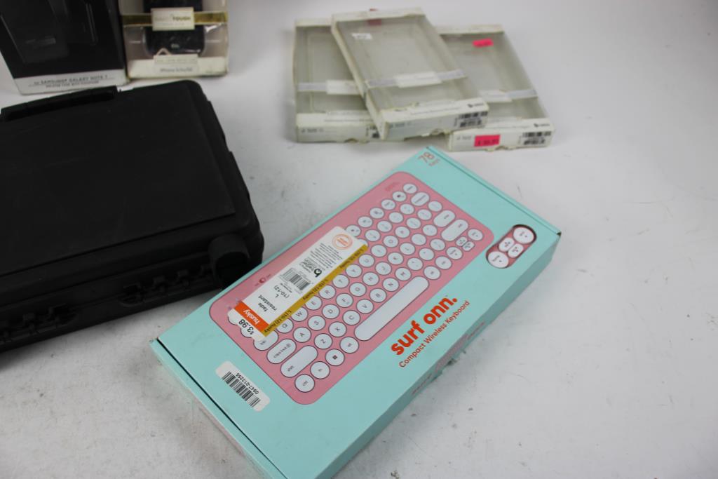 Wireless Keyboard, Gun Case, And Phones Cases | Property Room