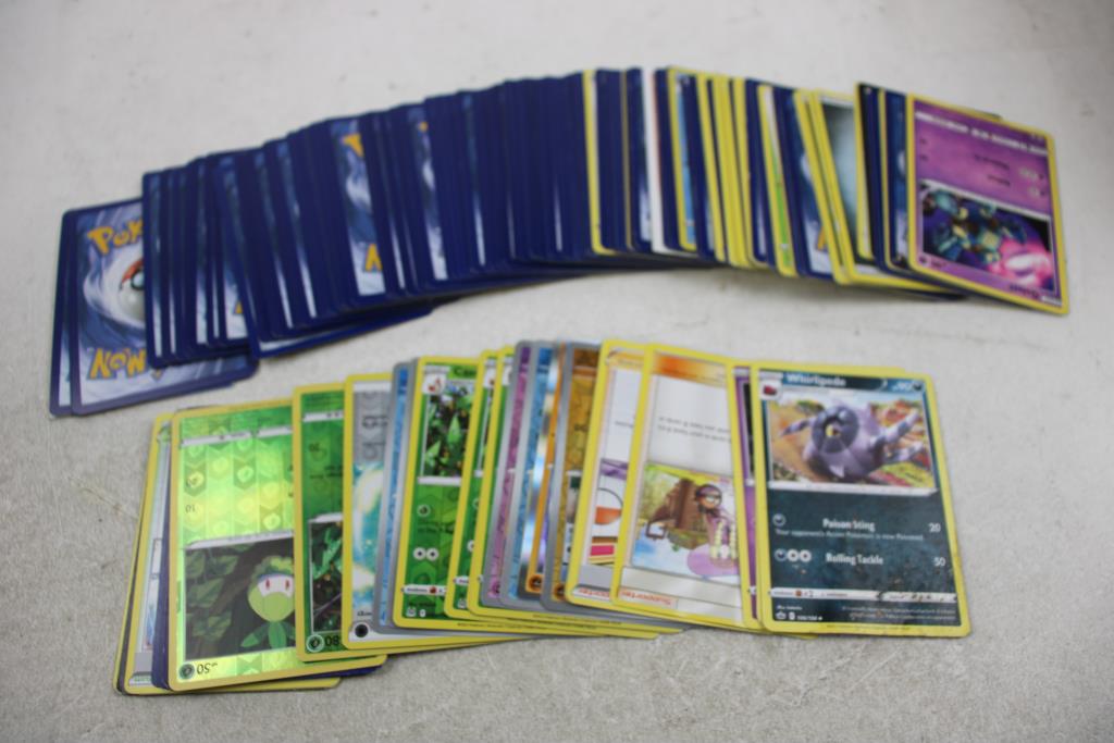 Xbox 360 And Tin Of Pokemon Cards | Property Room