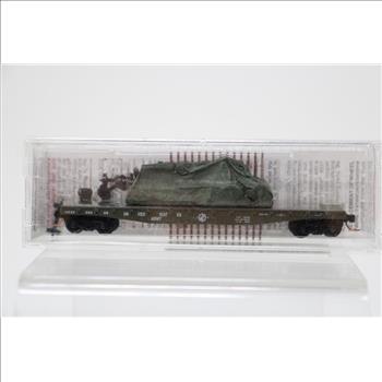 Micro-Trains Line 50' Flat Car Fishbelly Side W/ Cannon Load | Property Room