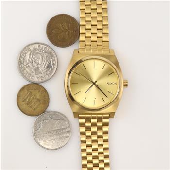 Nixon Time Teller Watch And Foreign Coins | Property Room