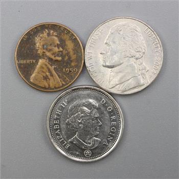 Two US Coins And A Canadian Coin | Property Room