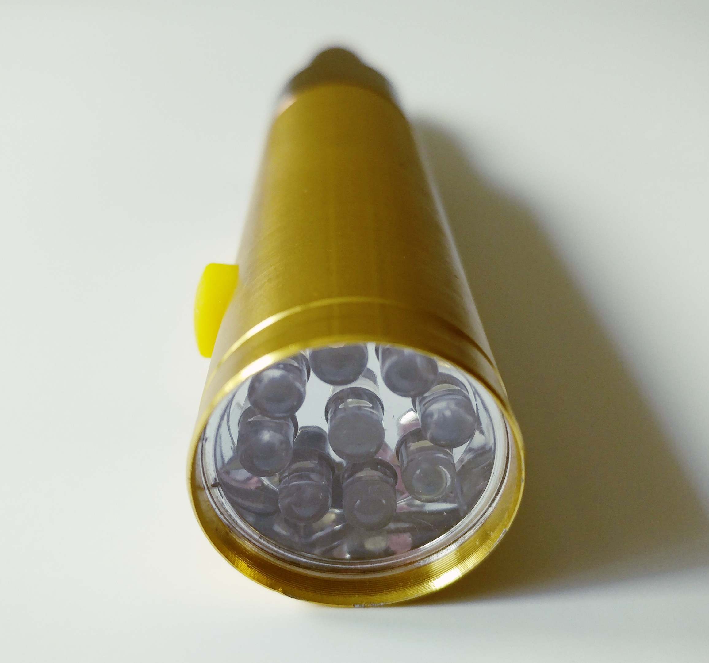 50 Caliber 9 LED Flashlight - Gold | Property Room