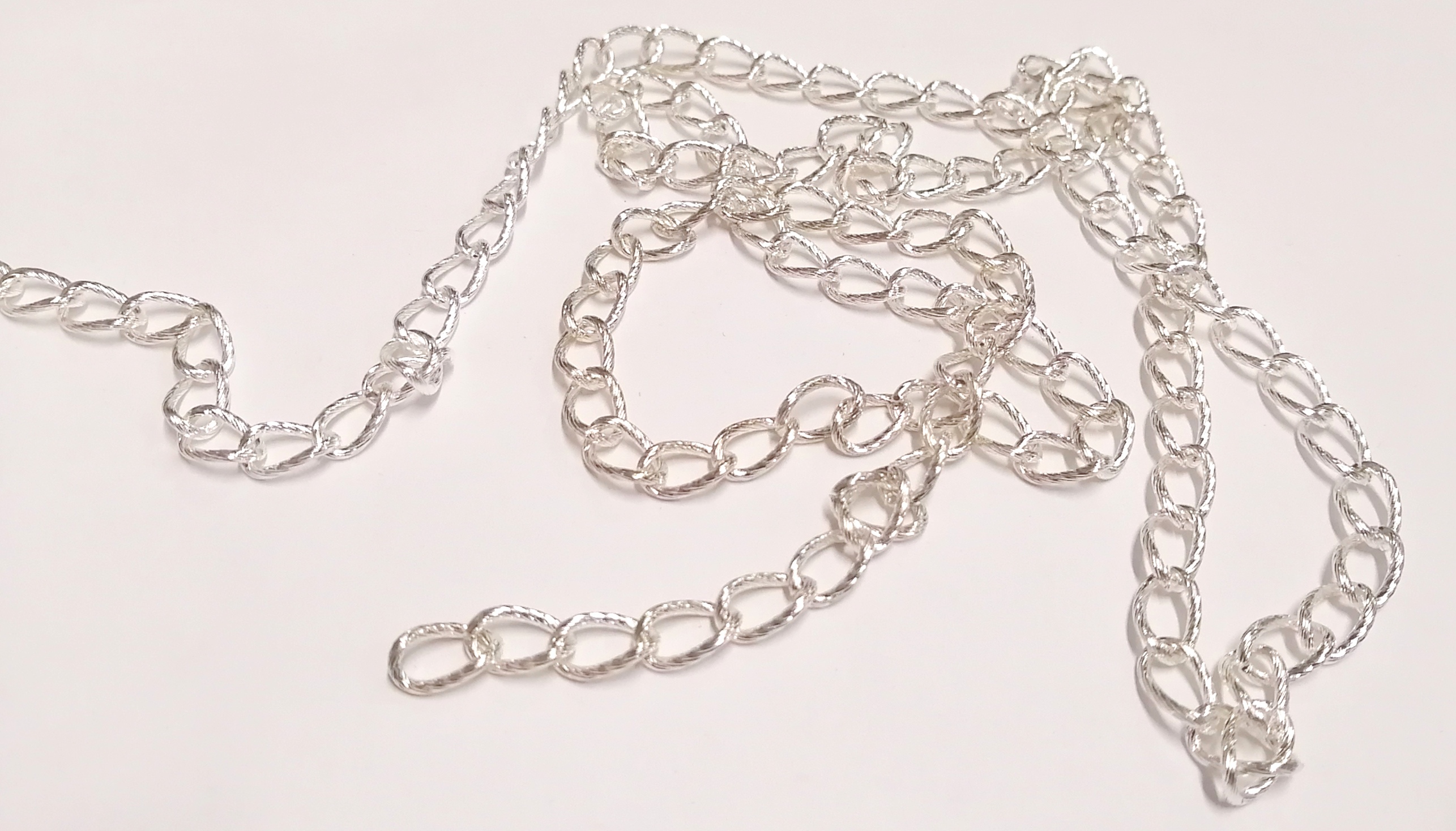 SILVER PLATED 8MM RIDGE CURB CHAIN -82 FEET | Property Room