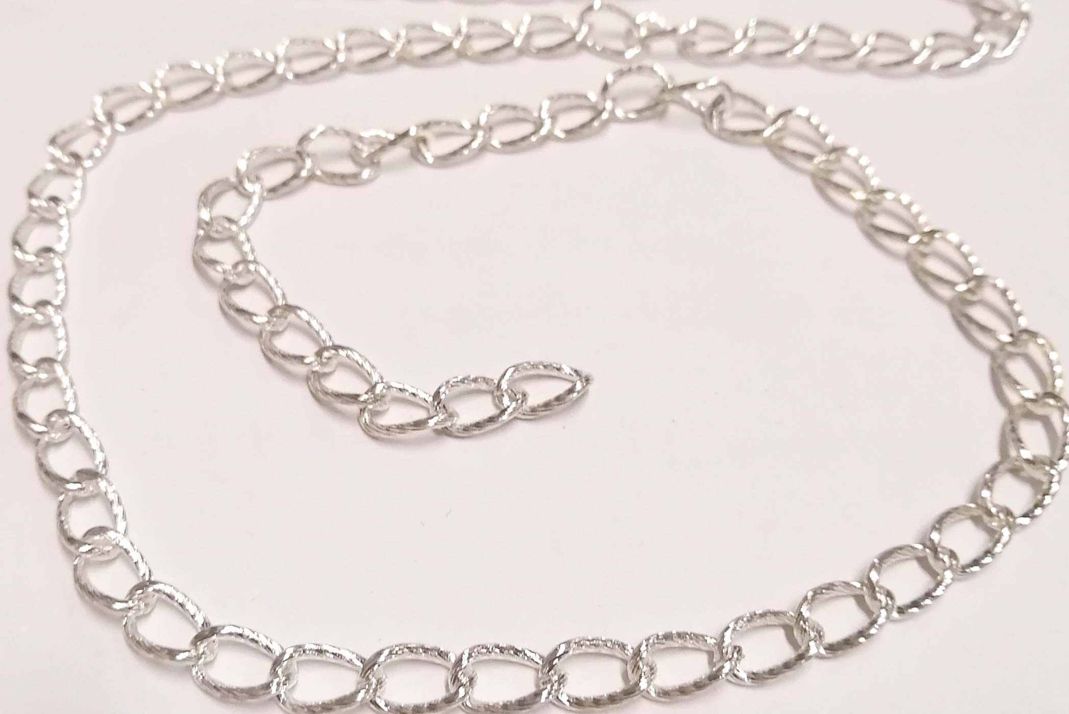 SILVER PLATED 8MM RIDGE CURB CHAIN -82 FEET | Property Room