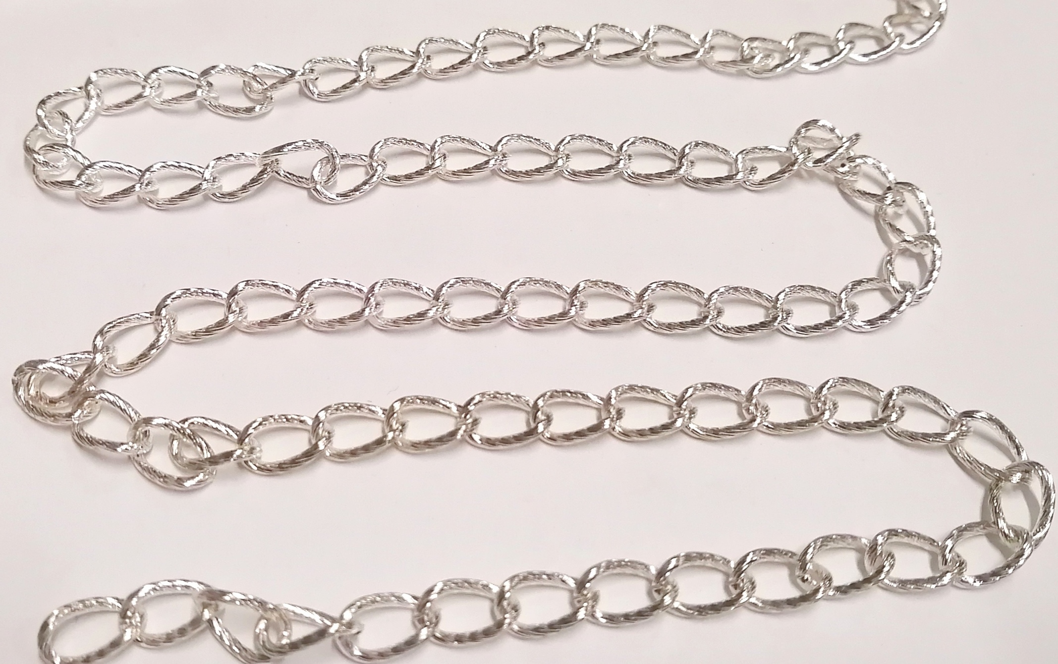 SILVER PLATED 8MM RIDGE CURB CHAIN -82 FEET | Property Room