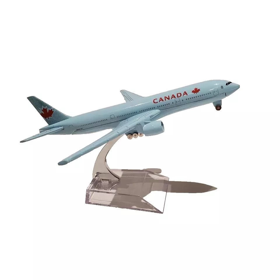 Die Cast Air Canada Model Airplane Boeing 777 Blue 7" | Property Room