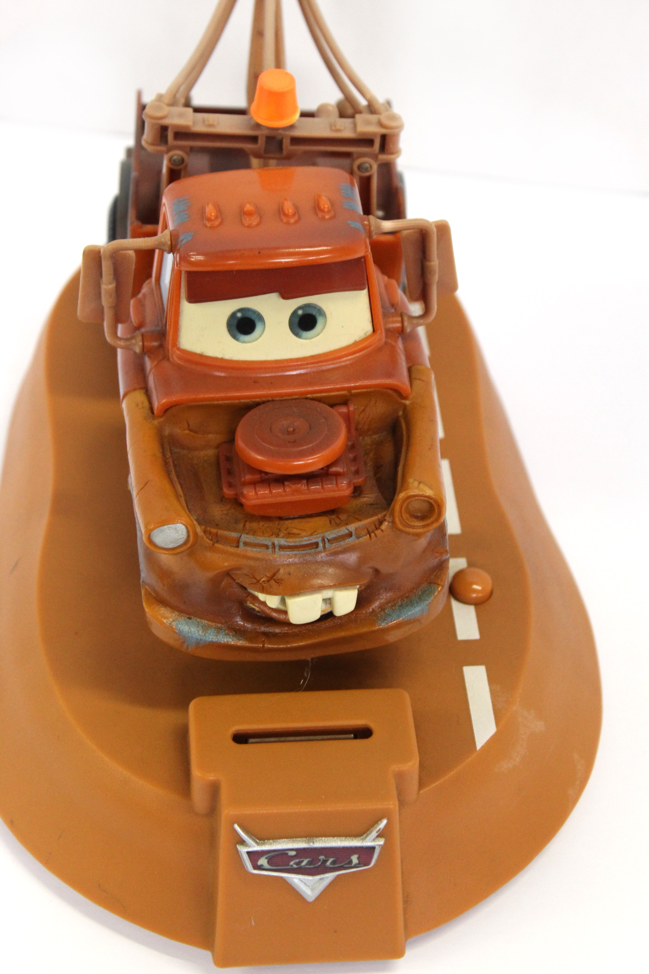 DISNEY PIXAR - CARS - MATER ANIMATED COIN BANK | Property Room