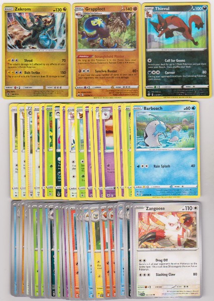 50 Different Pokemon Trading Cards w/ 3 HOLOS + More | Property Room