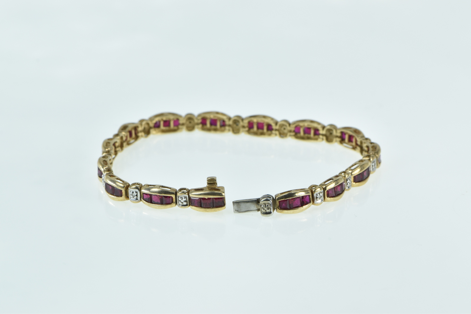 10K Diamond Syn. Princess Ruby Curved Bar Link Yellow Gold Bracelet 6.75" | Property Room