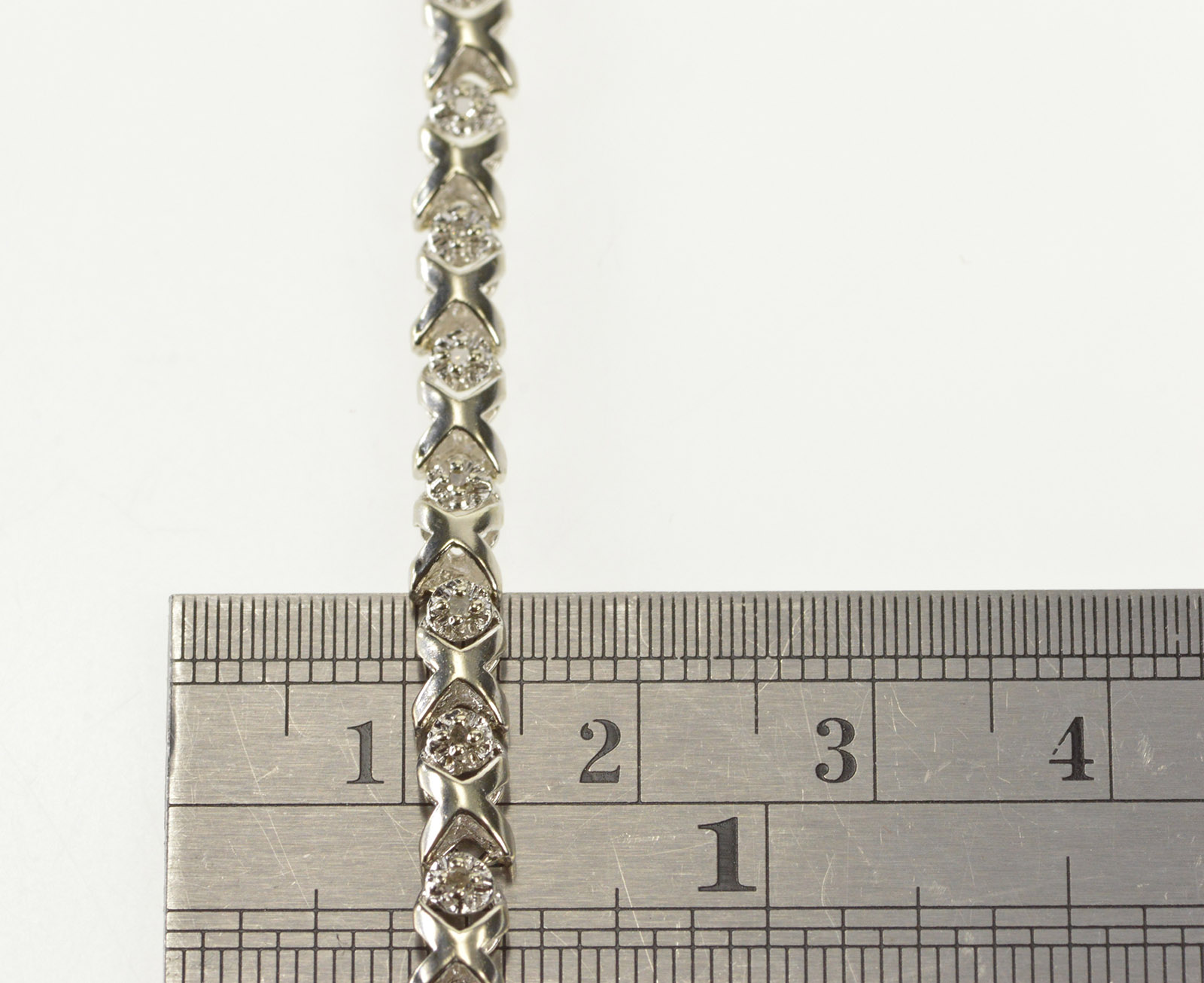 10k Diamond Xo Hugs And Kisses Link Tennis White Gold Bracelet 7 75