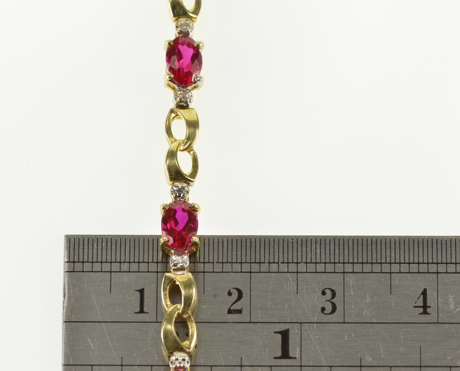 10K Oval Cut Ruby Diamond Inset Infinity Tennis Yellow Gold Bracelet 7 ...