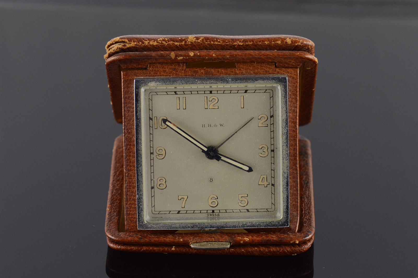 Base Metal Vintage H. H. & W. Mechanical Travel Alarm Clock | Property Room