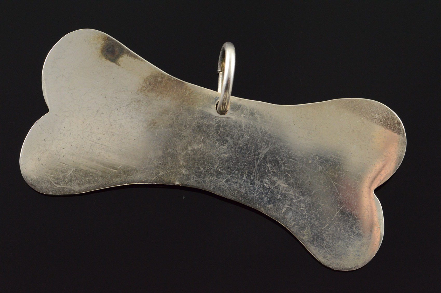 Sterling Silver Simple Bone-Shaped Dog Tag | Property Room