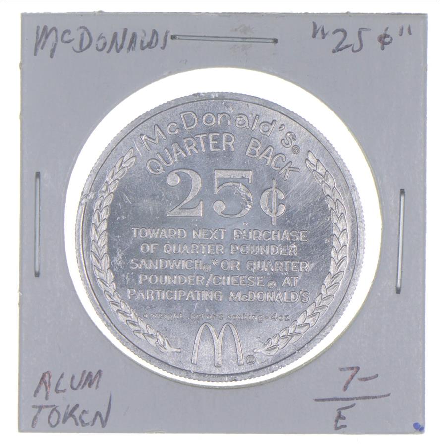1980s McDonald's Quarter Back Aluminum Token | Property Room