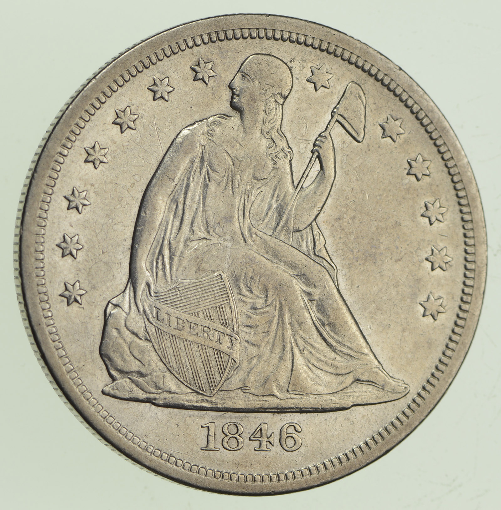 1846-O Seated Liberty Silver Dollar - Near Uncirculated | Property Room