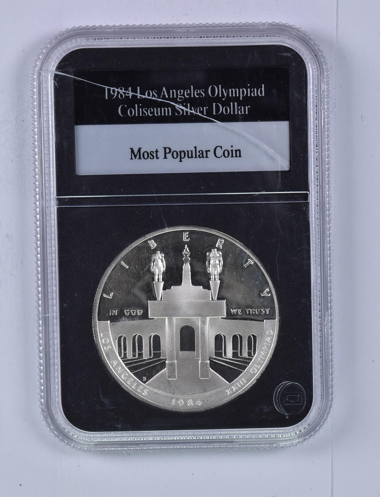 1984-S Los Angeles Olympics Commemorative Dollar - Slabbed | Property Room