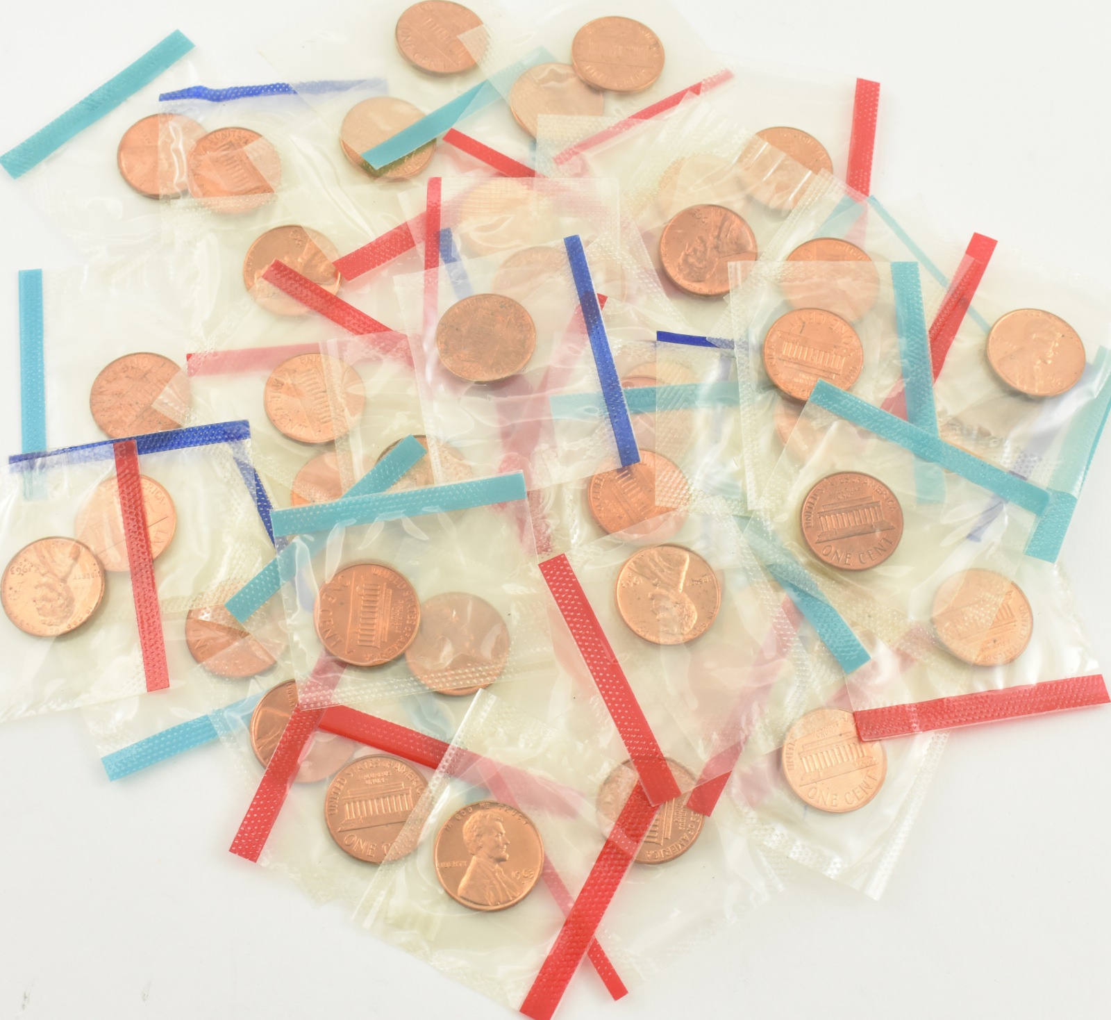 50 Pcs - US Mint Lincoln Cent 1960's sealed in Mint Cello | Property Room
