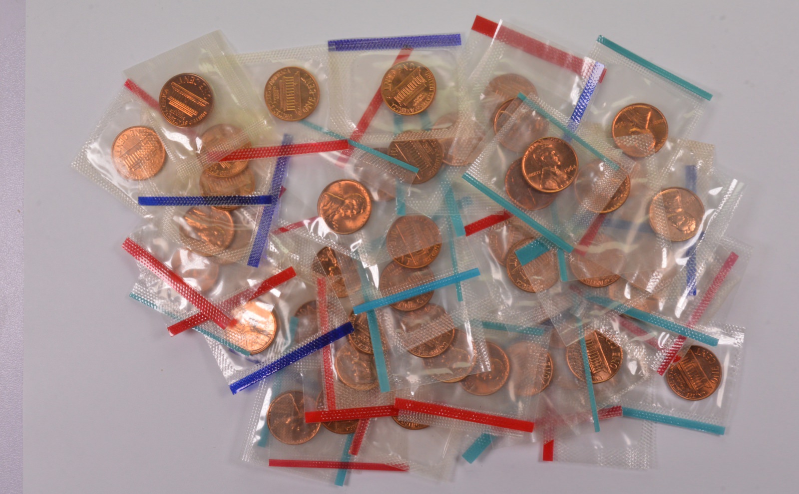 50 Pcs - US Mint Lincoln Cent 1960's Sealed in Mint Cello | Property Room
