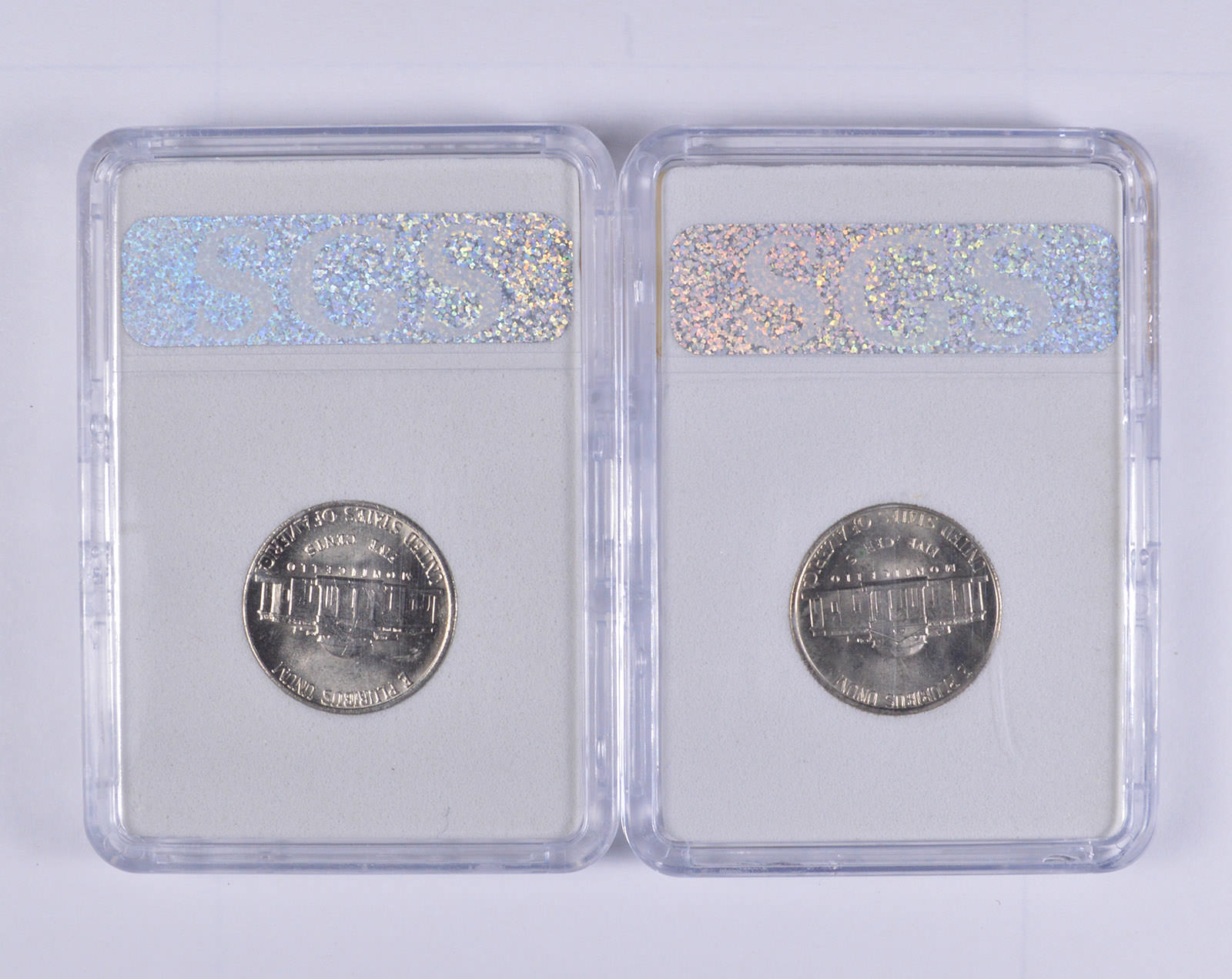 Lot of 2 Different SLABS - Graded Coins | Property Room
