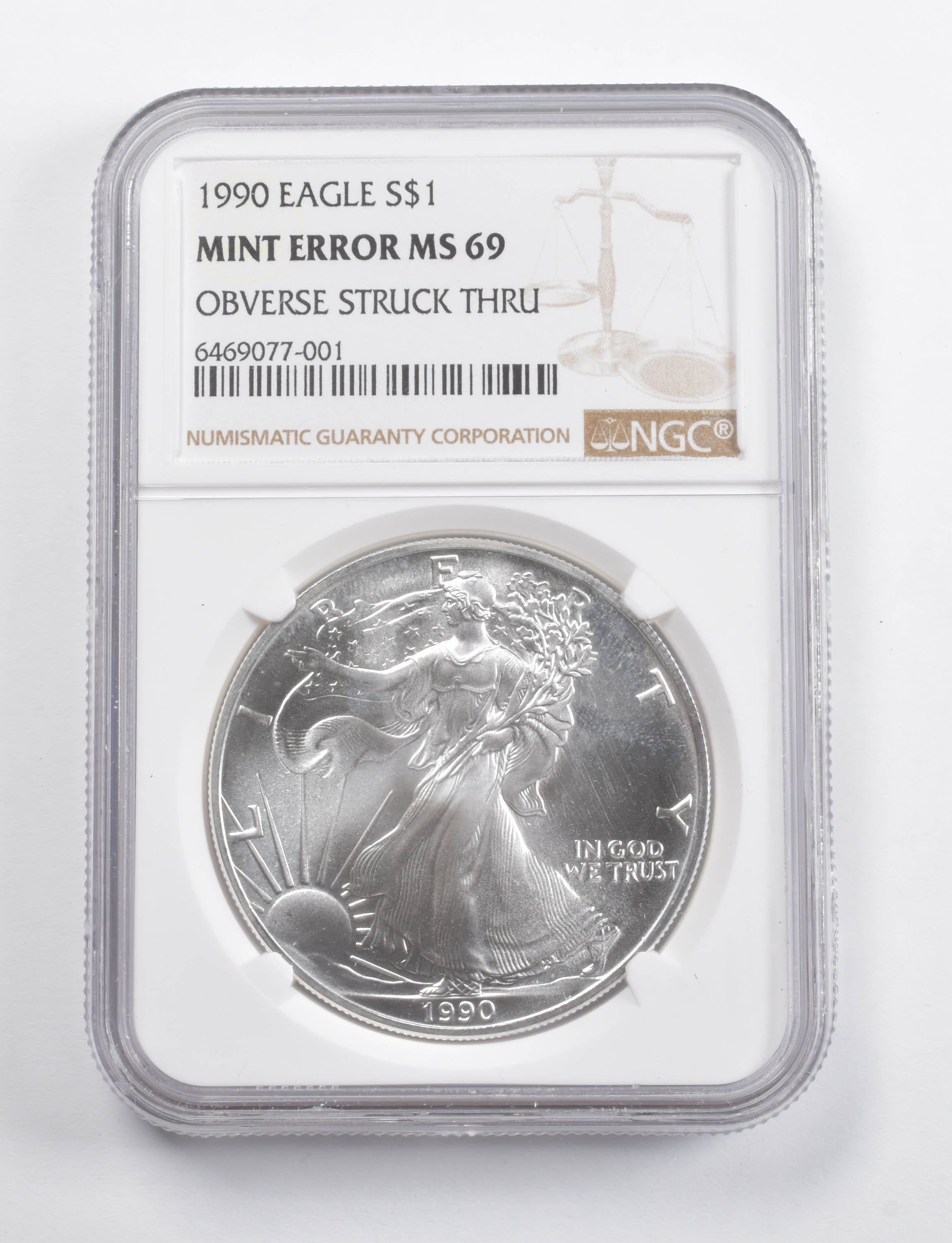Mint Error MS69 1990 American Silver Eagle OBV Struck Thru NGC ...