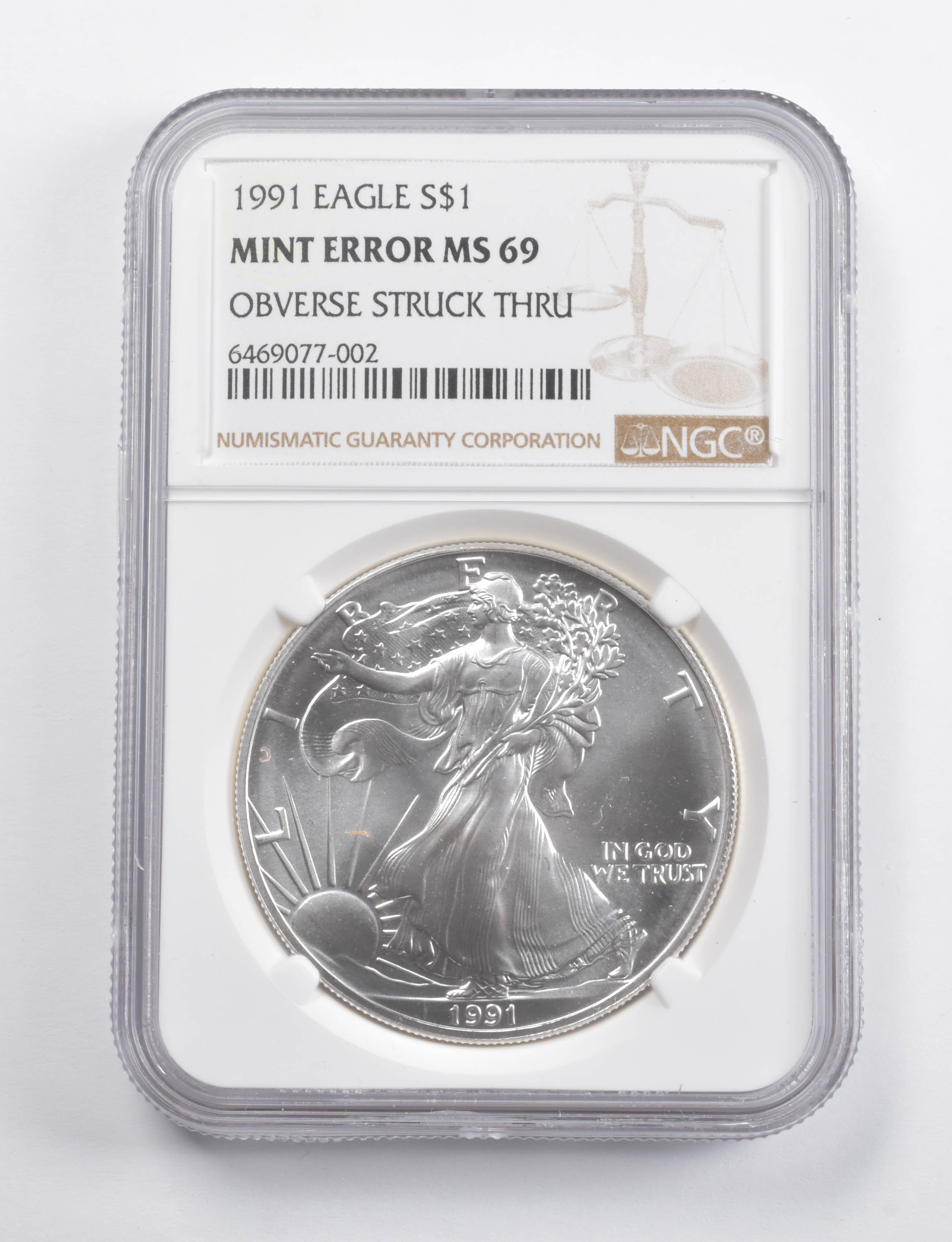 Mint Error MS69 1991 American Silver Eagle OBV Struck Thru NGC | Property Room