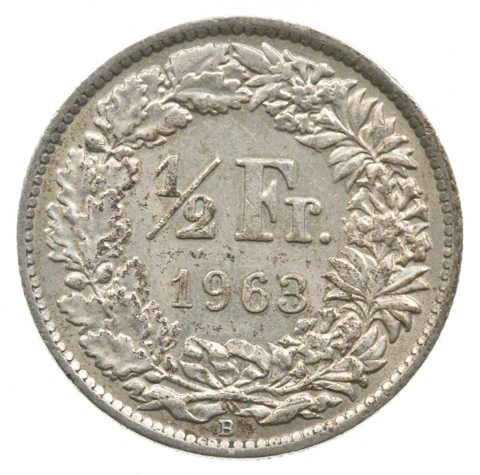 SILVER - Roughly the Size of a Dime - 1963 Switzerland 1/2 Franc - World Silver Coin | Property Room