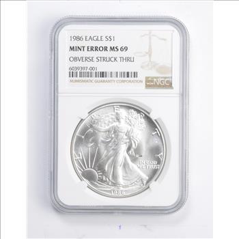 MS69 1986 American Silver Eagle - Mint Error - Obverse Struck Thru - Graded NGC | Property Room