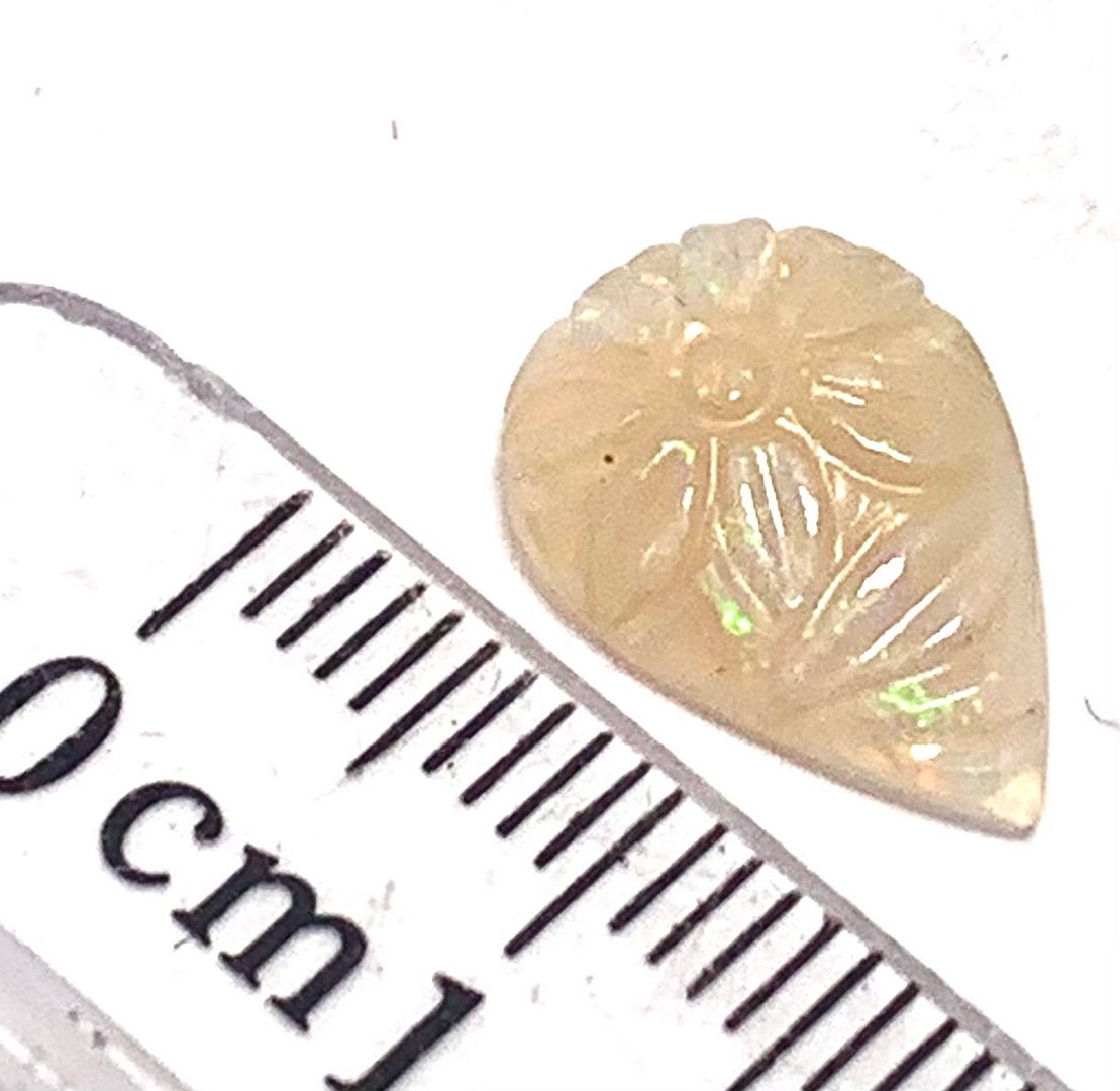 $175 Natural Hand Carved Opal 2.02ctw Measurement 14X9 MM | Property Room