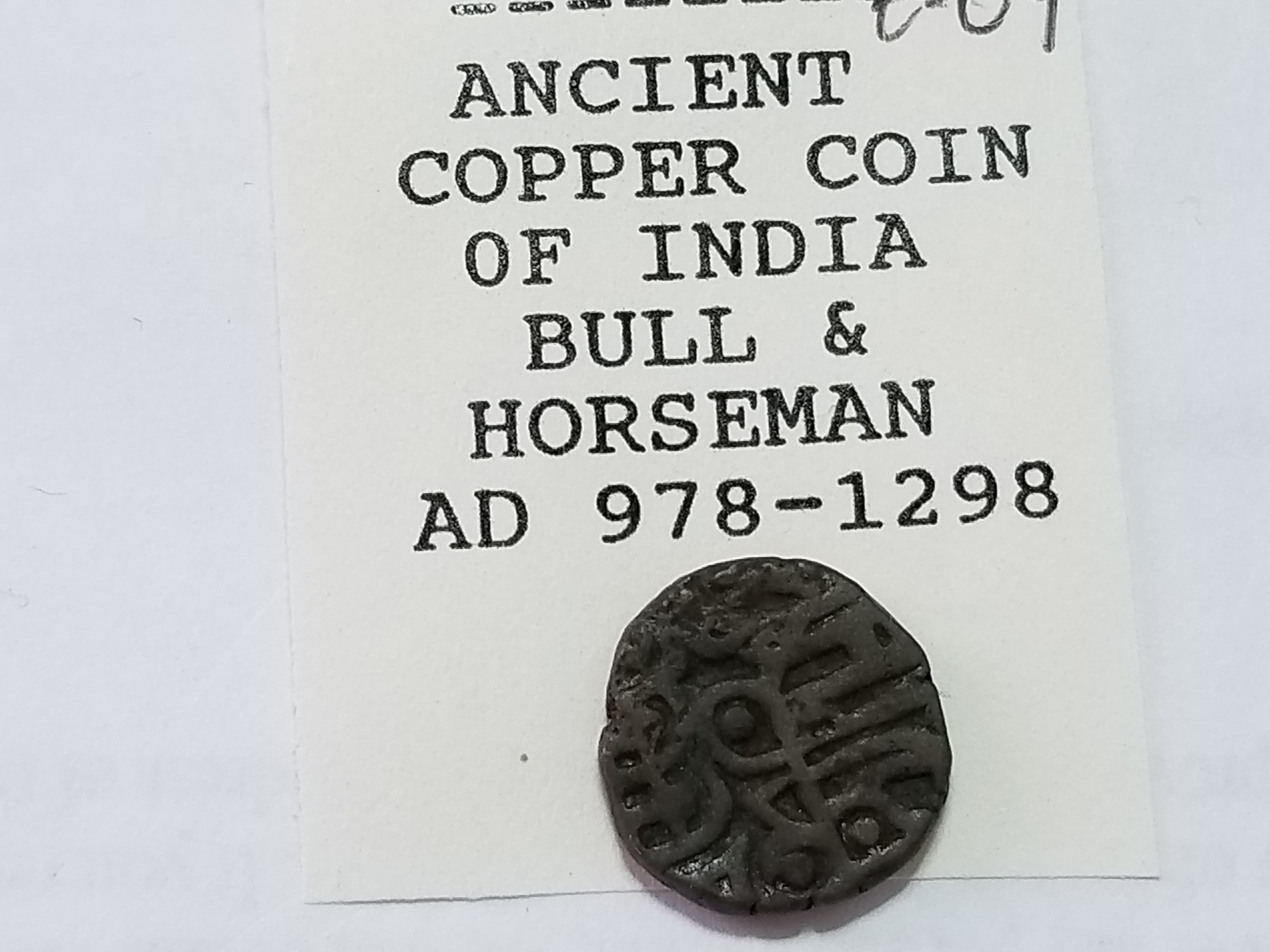 978-1298 Ancient Copper Coin Of India Bull And Horseman | Property Room