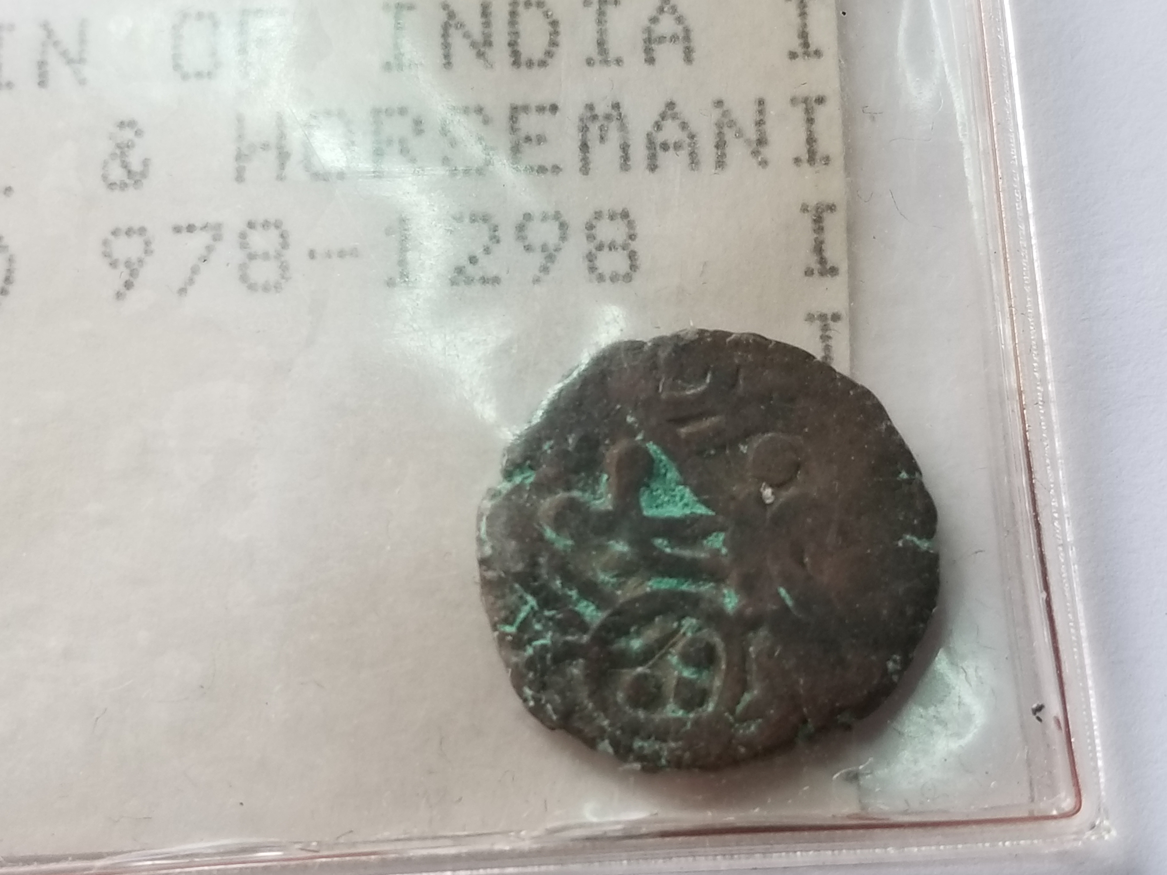 978-1298 Ancient Copper Coin Of India Bull And Horseman | Property Room