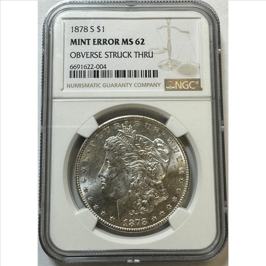 MINT ERROR 1878-S Morgan Silver Dollar w/Struck Thru Wire Error NGC Graded MS62 | Property Room