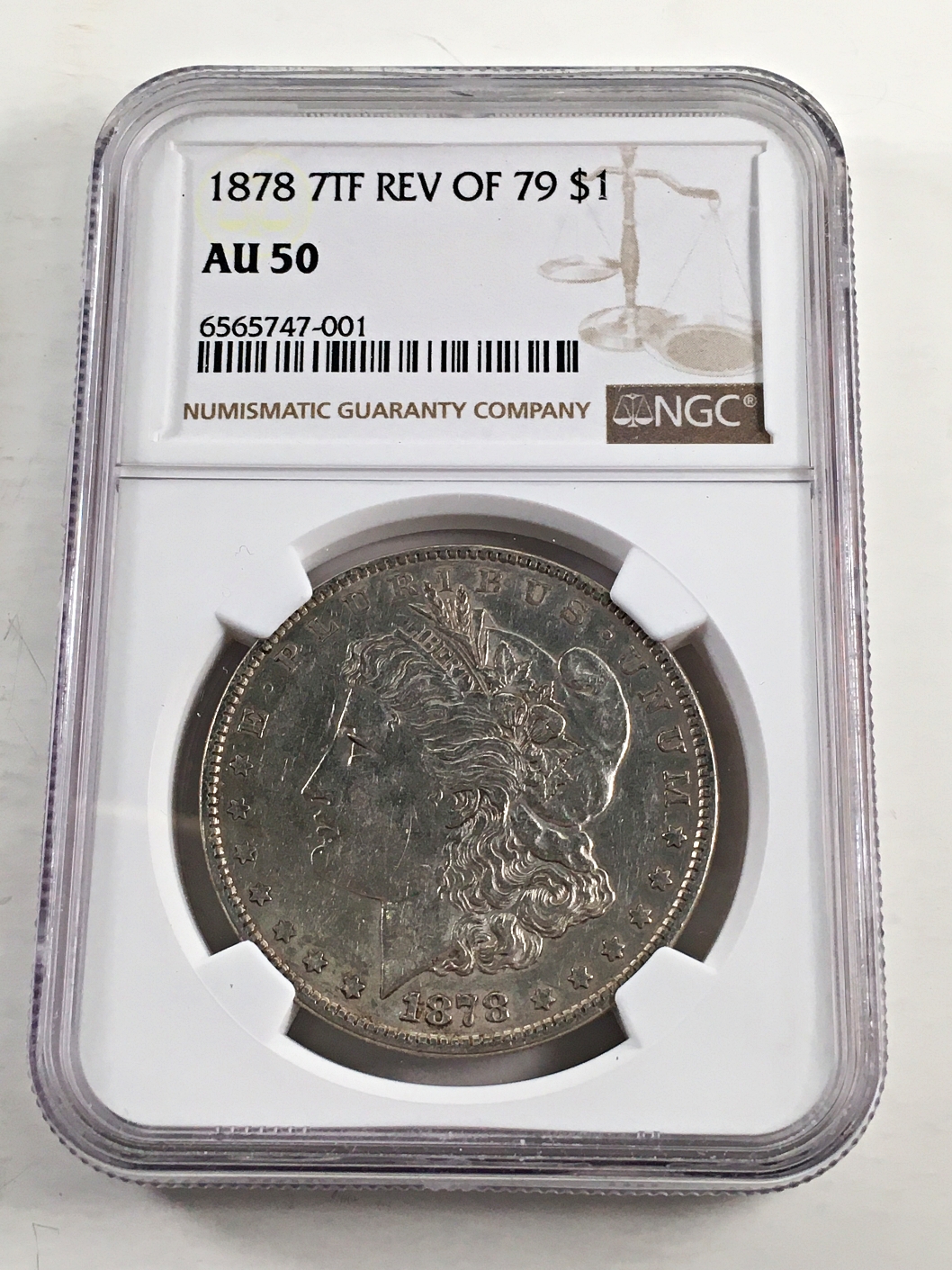 1878 7TF Rev of 79 Morgan Silver Dollar*Graded AU50 by NGC | Property Room