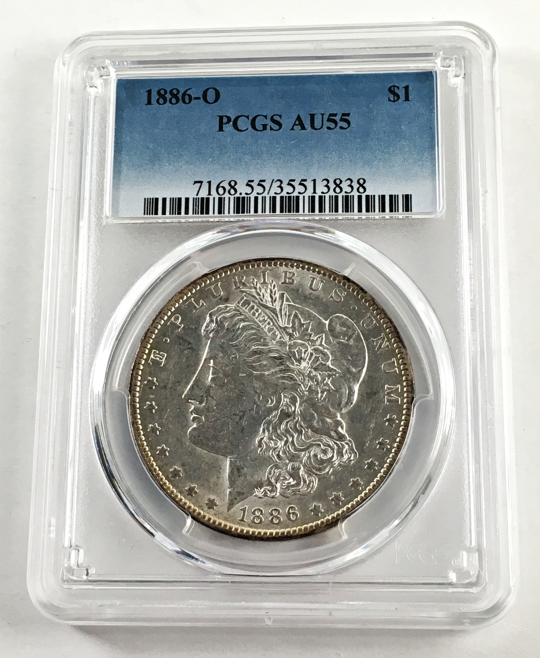 1886-O $1 Silver Morgan Dollar graded AU55 by PCGS | Property Room