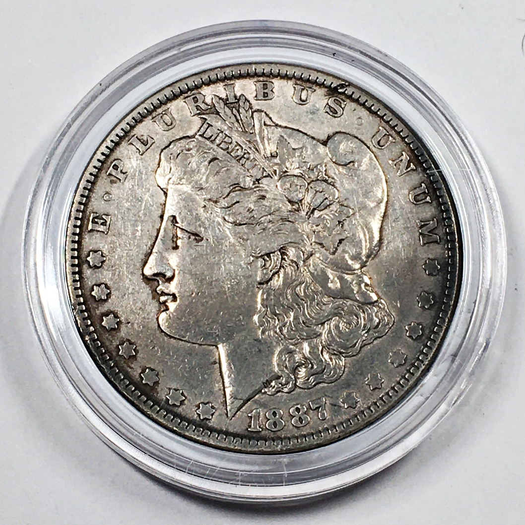 1887 American Silver Morgan Dollar w/ Capsule | Property Room